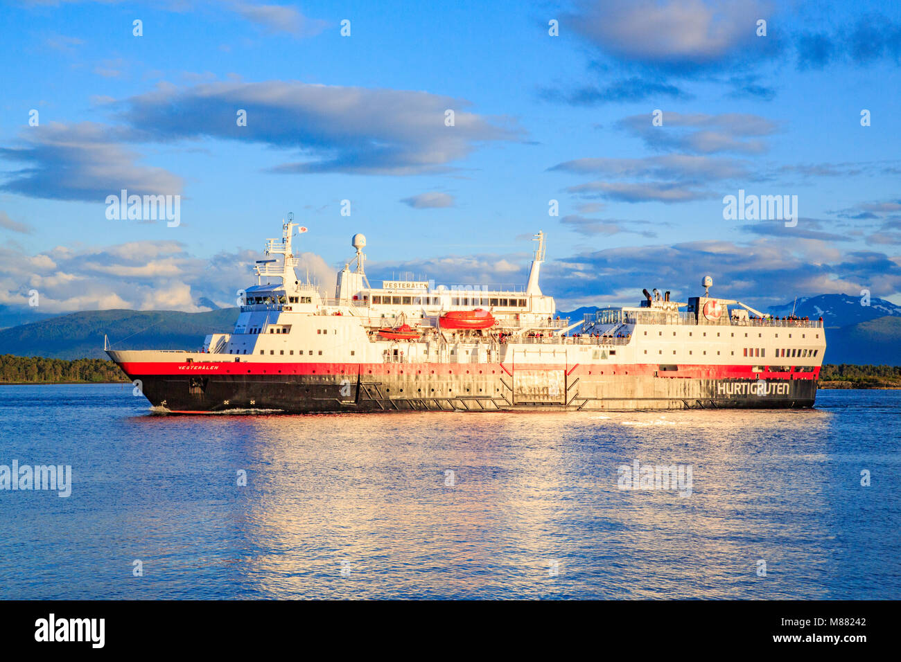 Hurtigruten ferry cruise boat sailing on the Fjord outside Molde ...