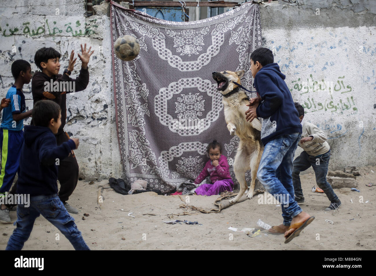 Gaza, Gaza Strip. 15th Mar, 2018. Palestinian children play football ...