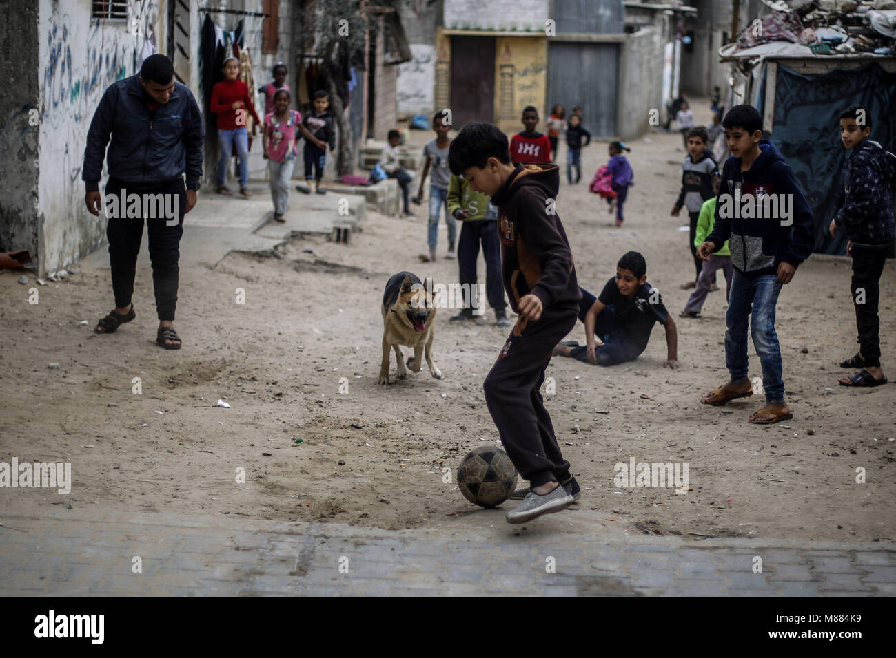 Gaza, Gaza Strip. 15th Mar, 2018. Palestinian children play football ...
