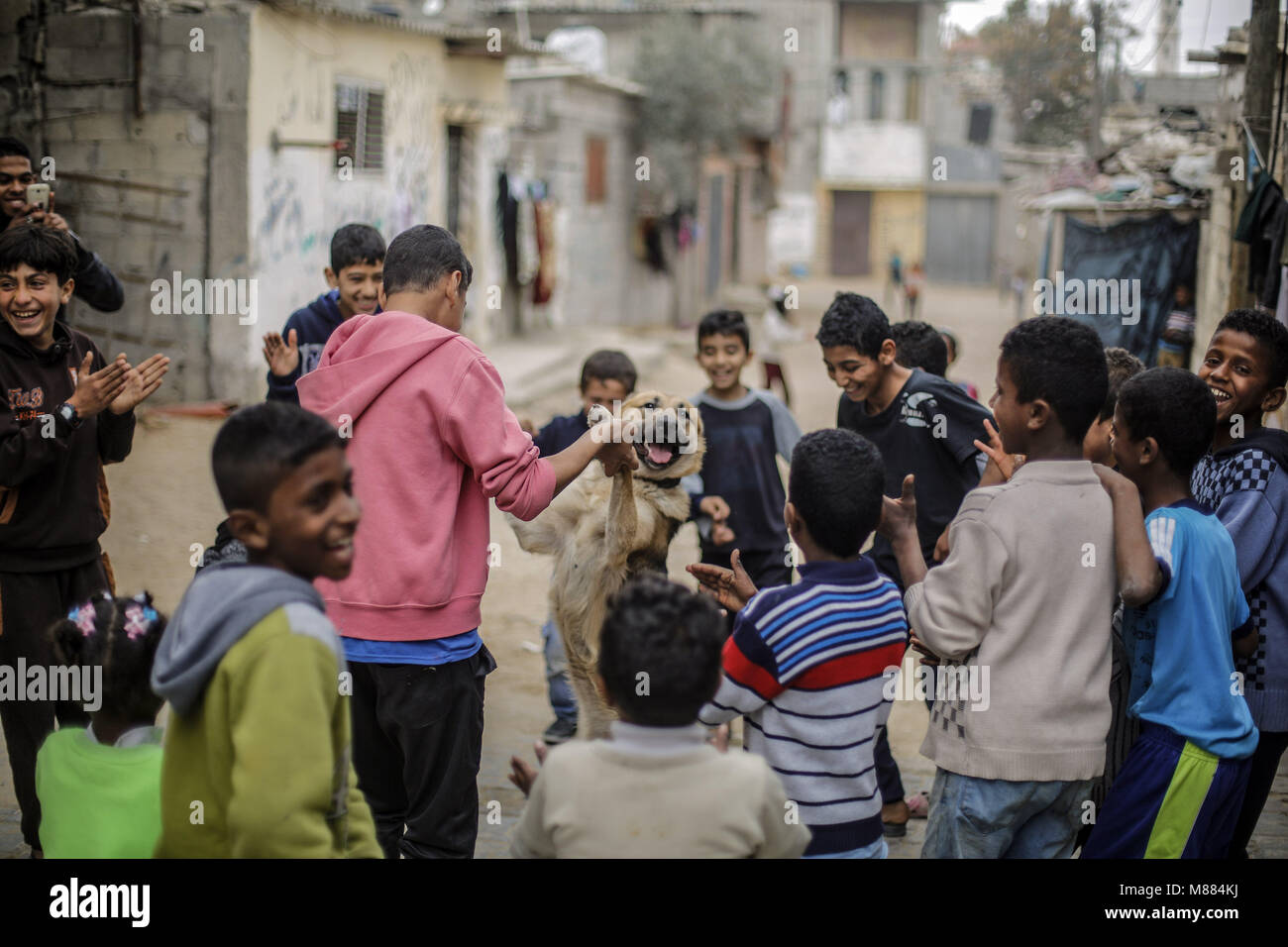Gaza, Gaza Strip. 15th Mar, 2018. Palestinian children play football ...