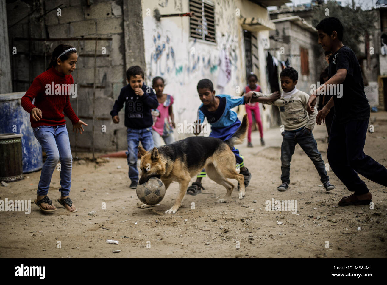 Palestinian children play football in hi-res stock photography and ...