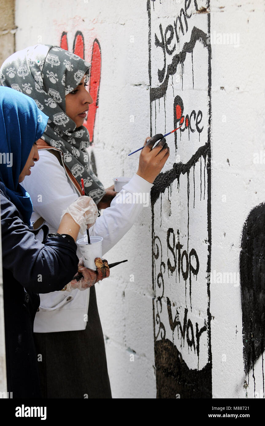 Sanaa, Yemen. 15th Mar, 2018. People work on a graffiti during an art ...