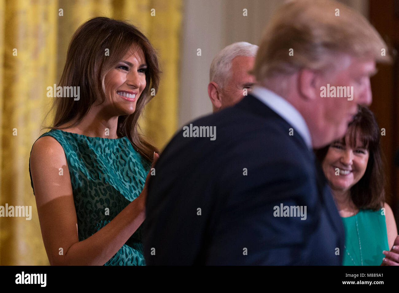 First lady Melania Trump claps as United States President Donald J ...
