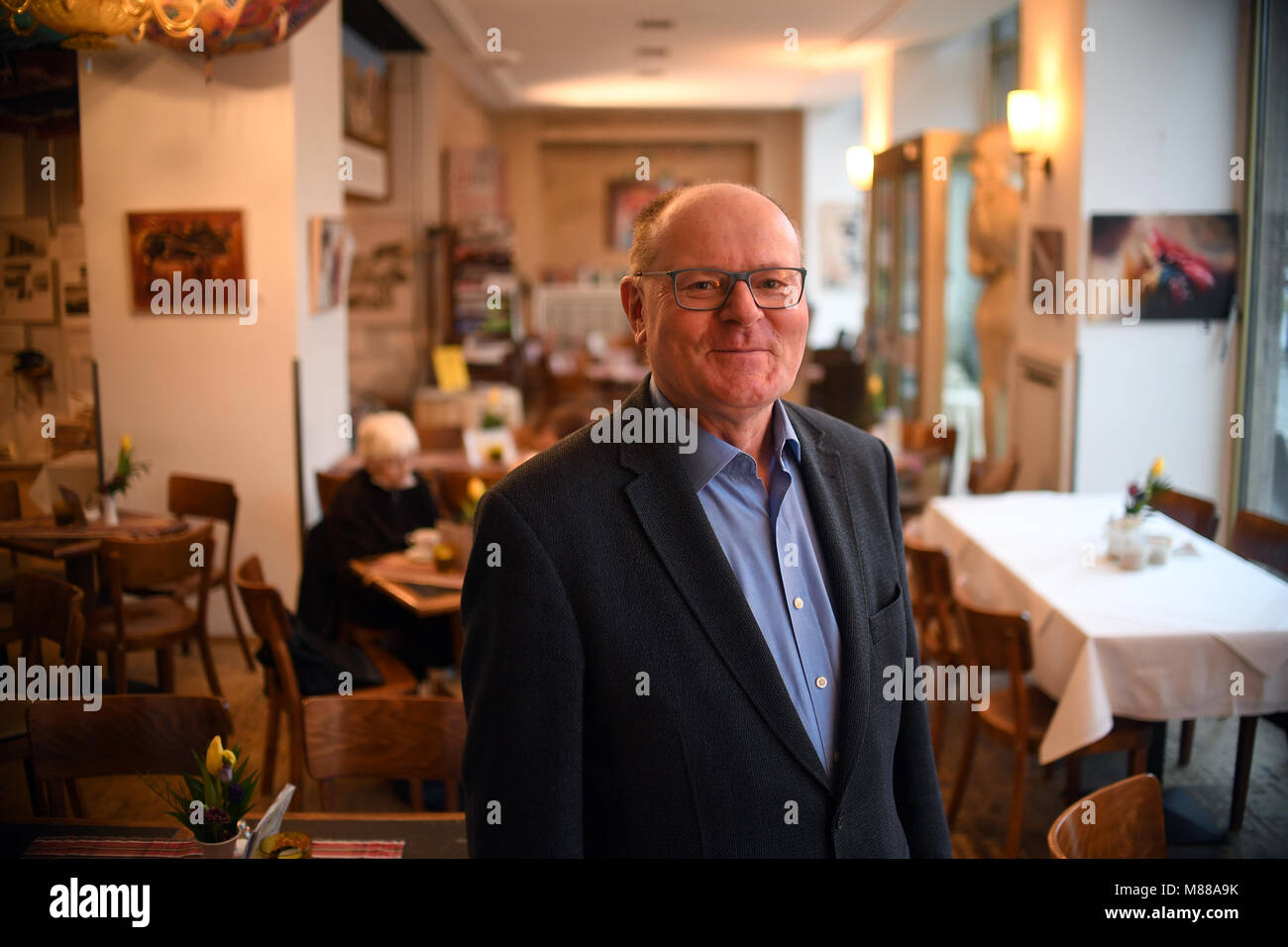 13 March 2018, Germany, Berlin: Uwe Radack, manager, standing in Cafe ...