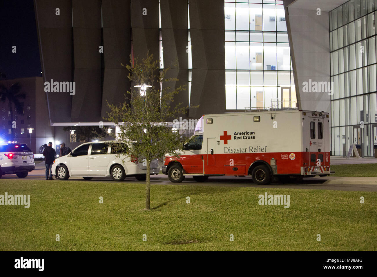 Miami, USA. 15th Mar, 2018. An ambulance is seen on the campus of ...