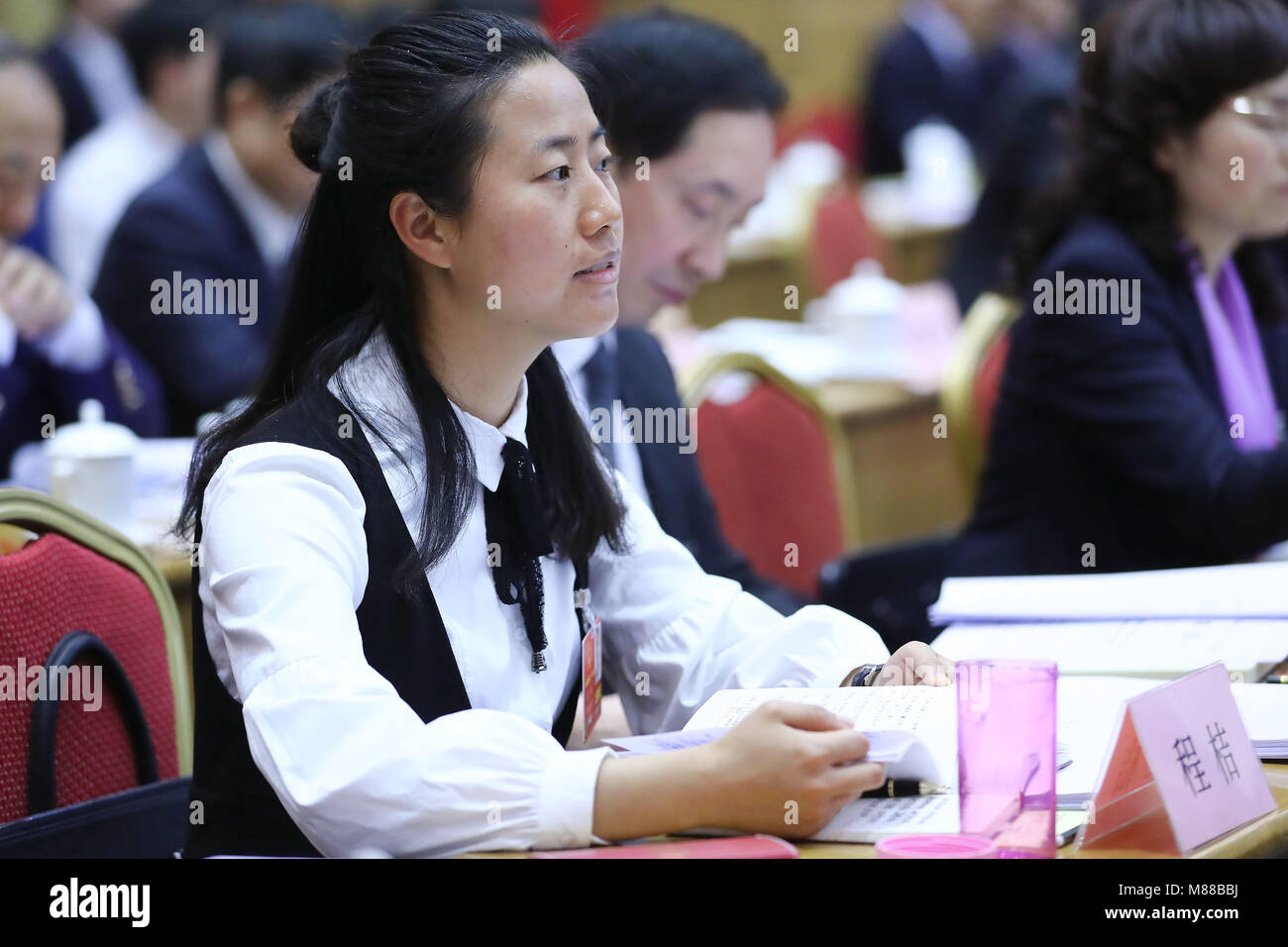 (180316) -- BEIJING, March 16, 2018 (Xinhua) -- Cheng Ju, a newly ...