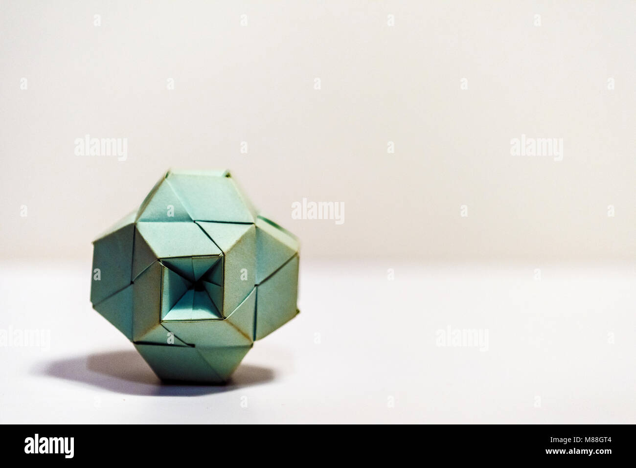 Origami paper small polyhedron macro closeup Stock Photo - Alamy