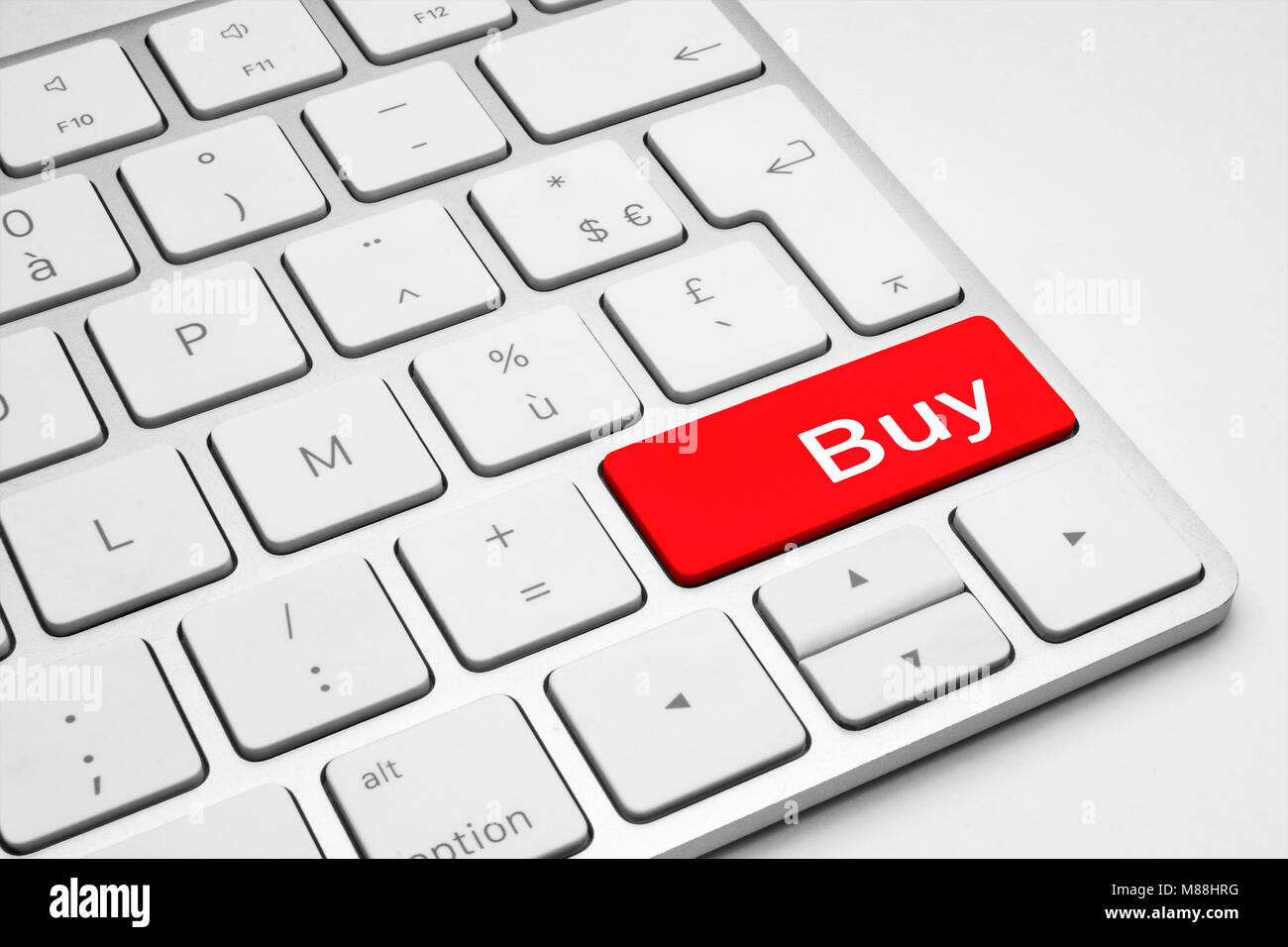 Red Buy button on a white keyboard isolated on a white background Stock ...