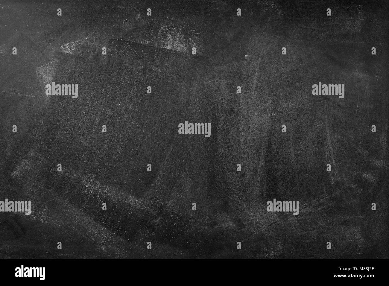 Chalk rubbed out on blackboard background Stock Photo - Alamy