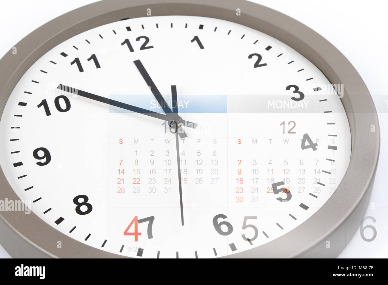 Clock face and calendar composite Stock Photo - Alamy