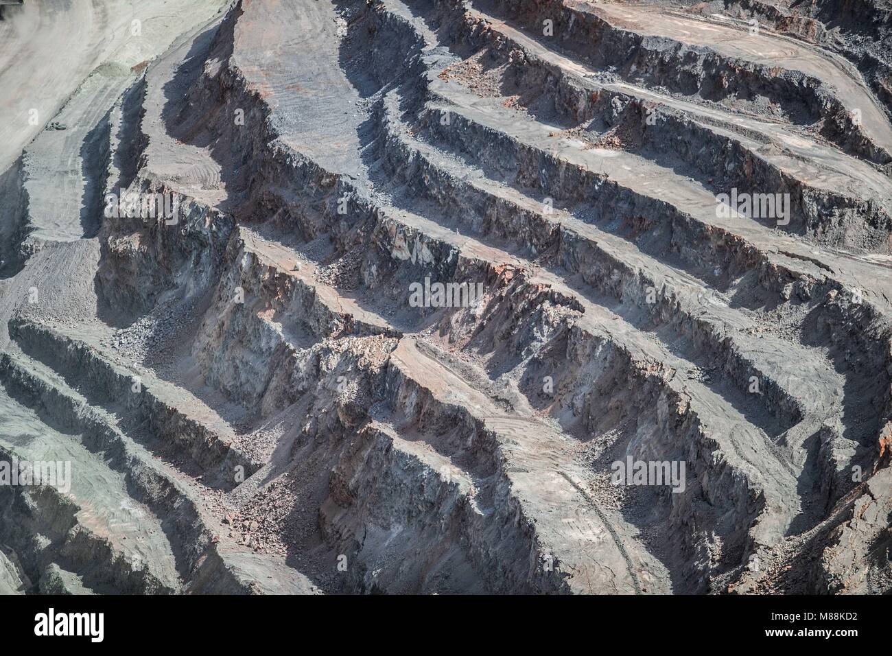 Panoramic view of open pit mine and blue sky located in the desert of ...