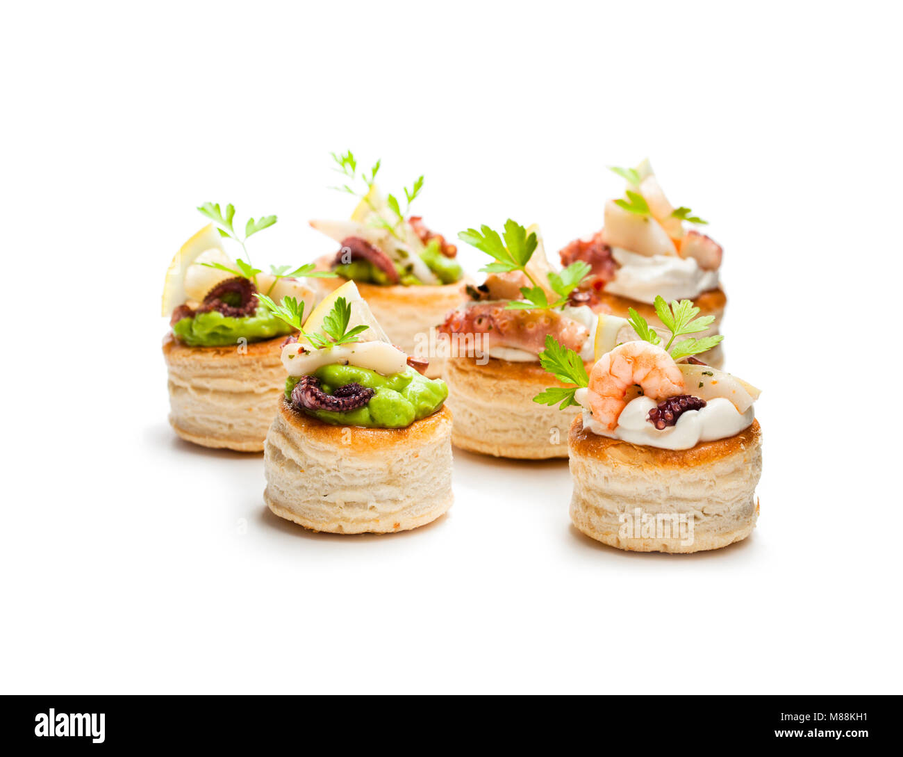 Vol-au-vents puff pastry cases filled with salted squid and octopus ...