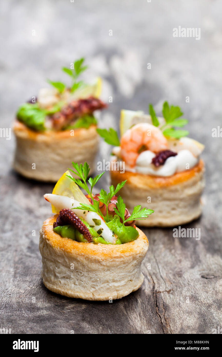 Vol-au-vents puff pastry cases filled with salted squid and octopus ...