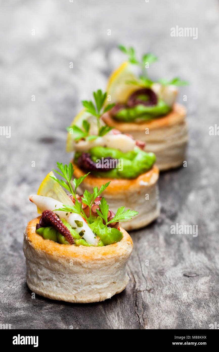 Vol-au-vents puff pastry cases filled with salted squid and octopus ...