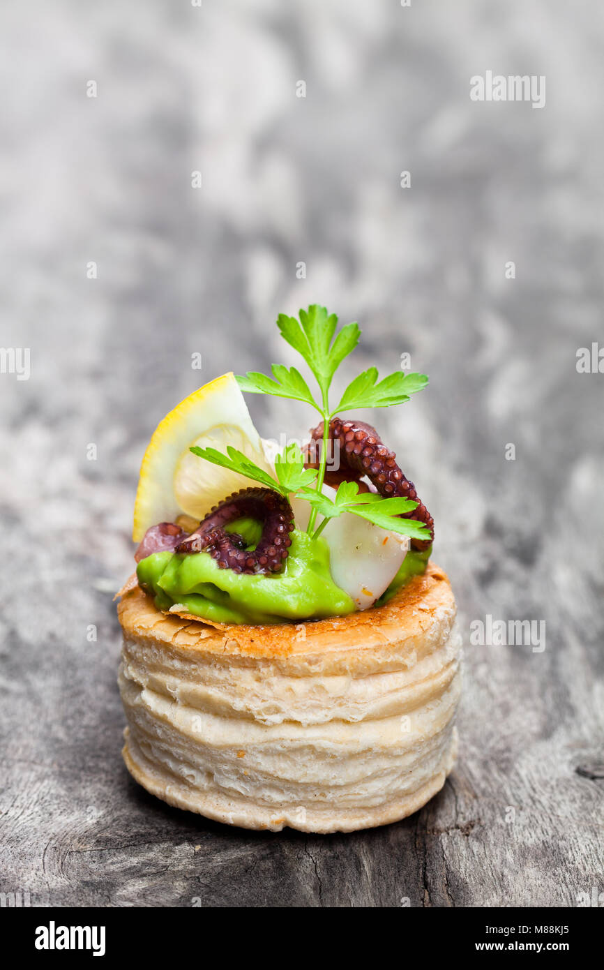 Vol-au-vents puff pastry cases filled with salted squid and octopus ...