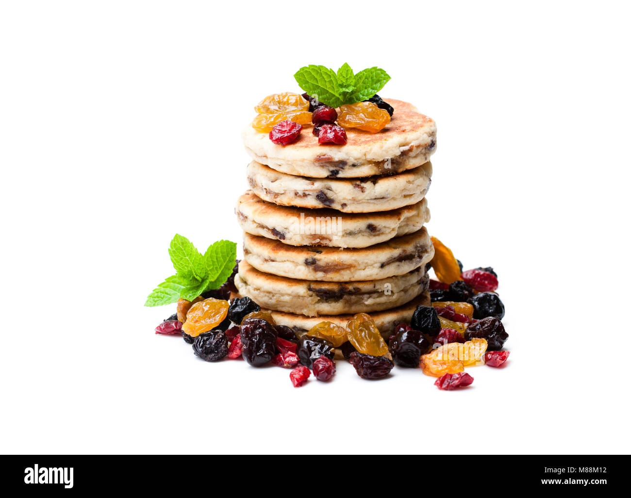 Stack of welsh cakes with dry berries isolated on white Stock Photo - Alamy