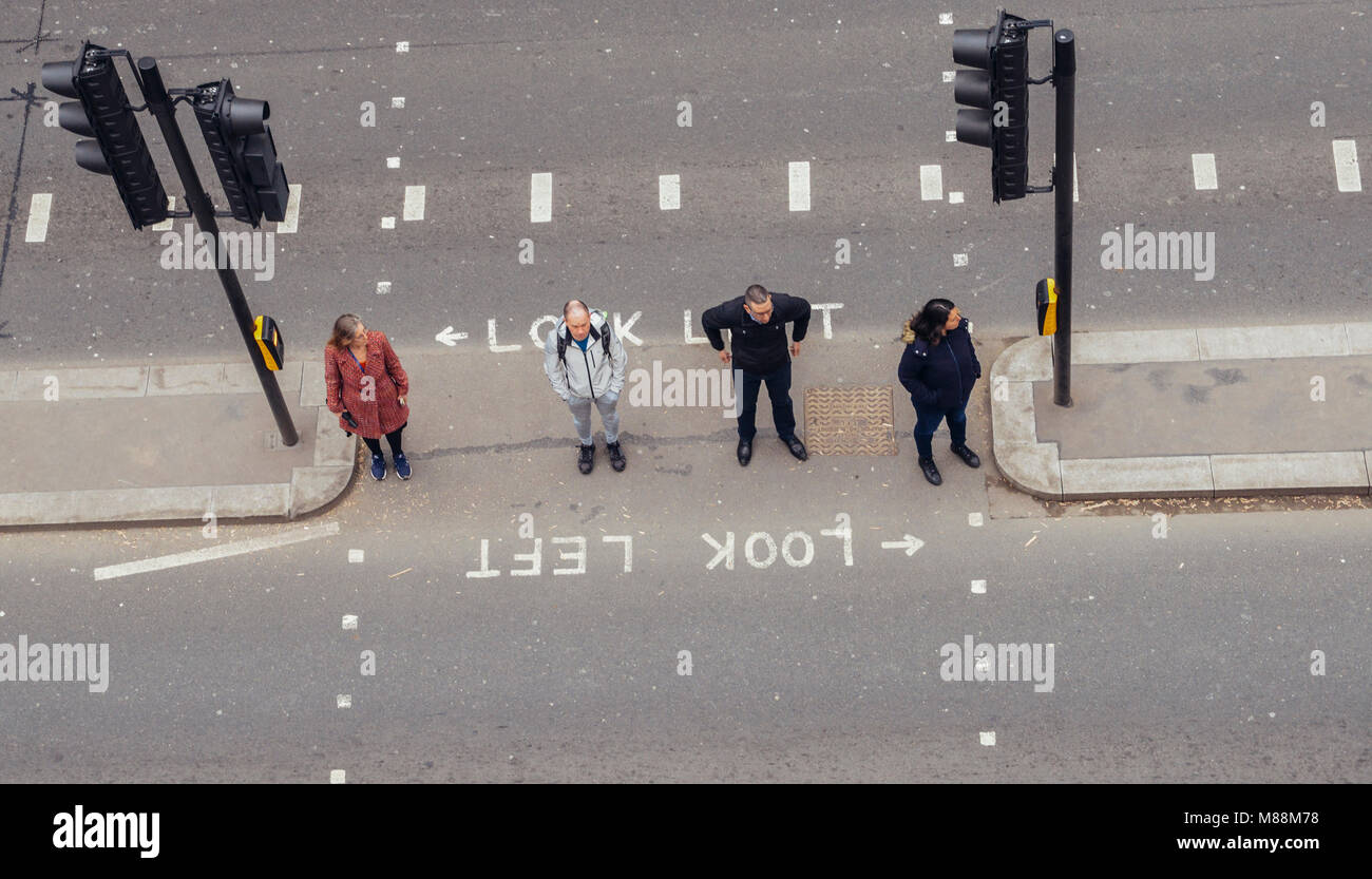 London, UK- Mar 13, 2018: High perspective view of pedestrians in the ...
