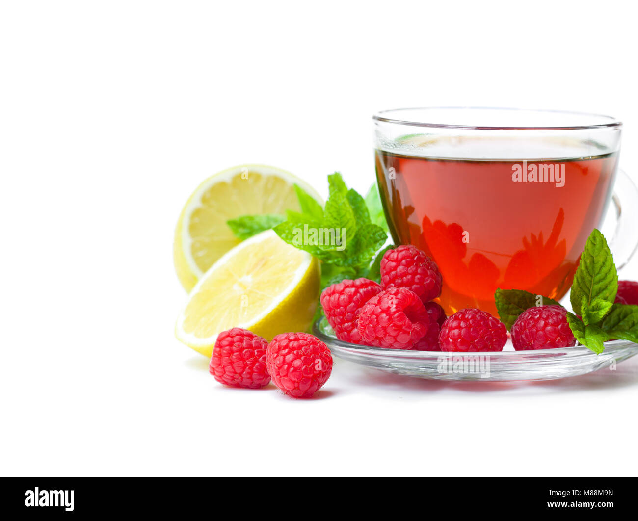 Red fruit tea with raspberry and mint isolated on white background ...