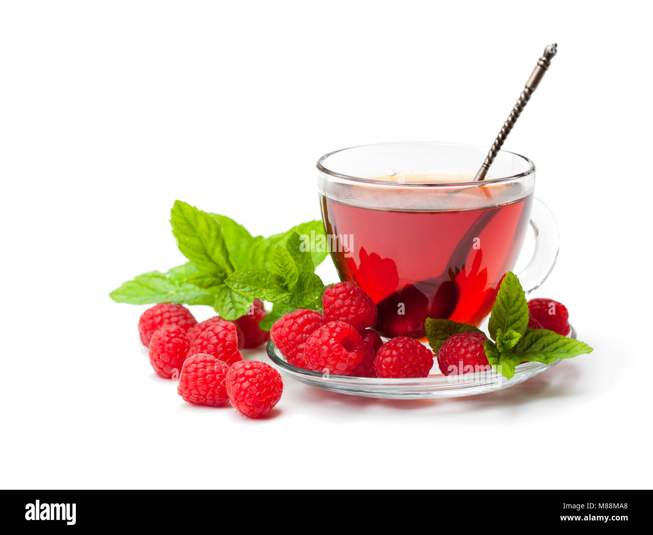 Red fruit tea with raspberry and mint isolated on white background ...