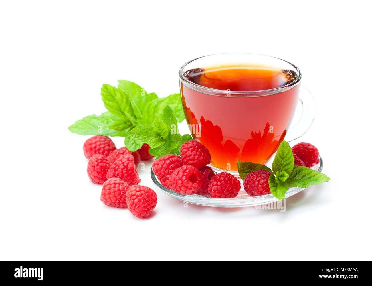 Red fruit tea with raspberry and mint isolated on white background ...