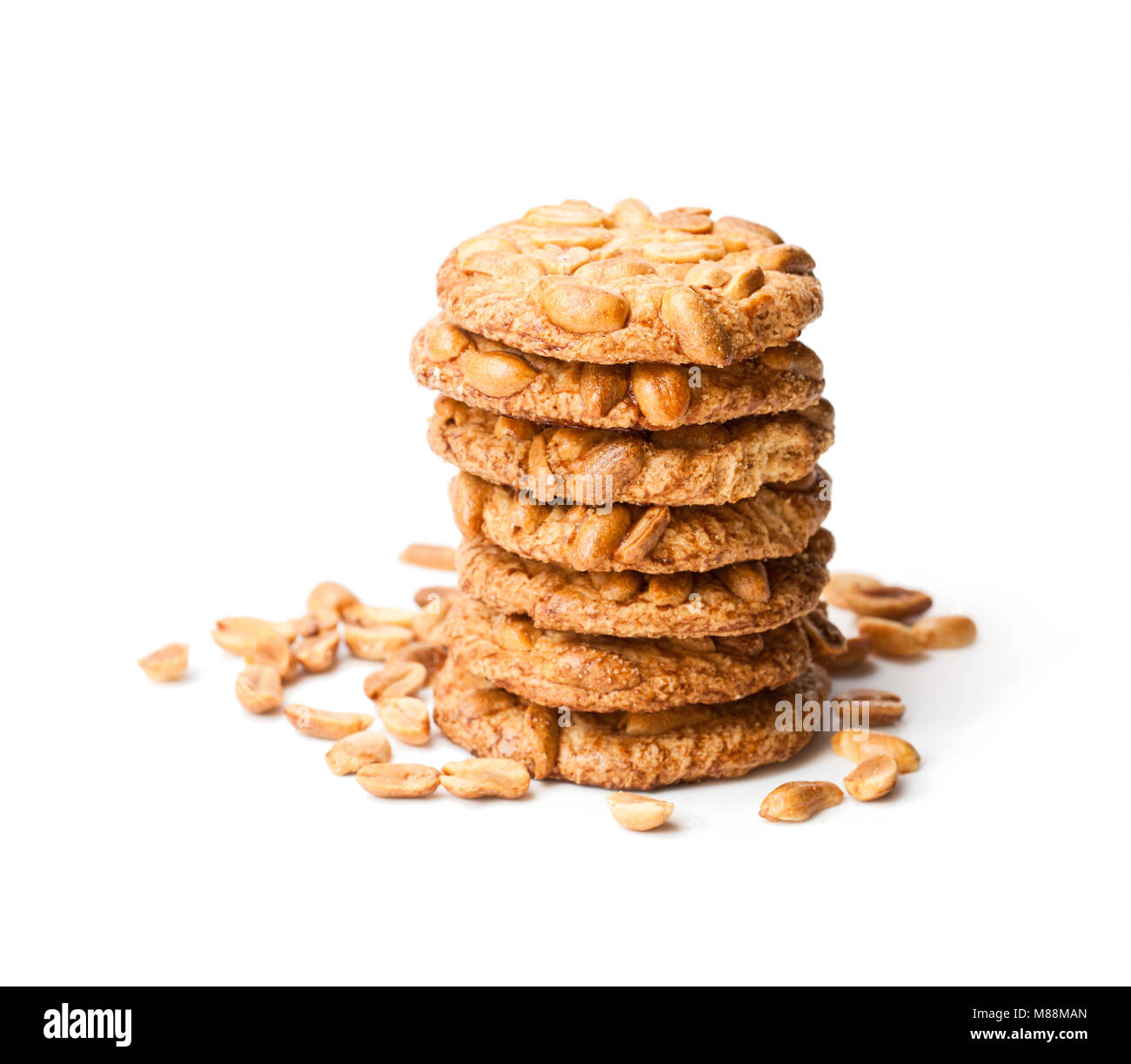 Stack of sugar cookies with monkey nuts isolated on white Stock Photo ...