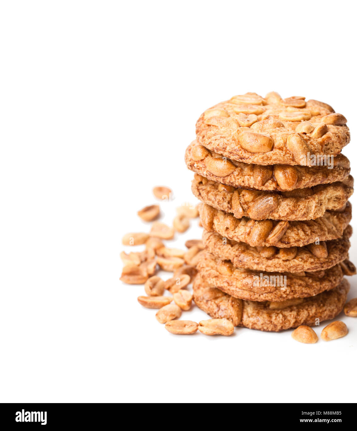 Stack of sugar cookies with monkey nuts isolated on white Stock Photo ...