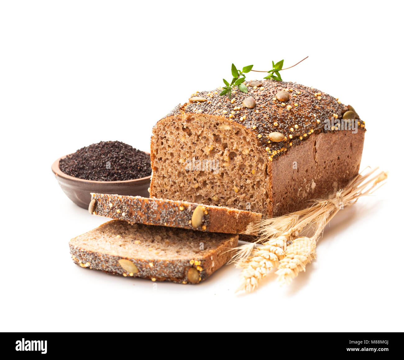 Homemade wholemeal rye bread with poppy seeds isolated on white Stock ...