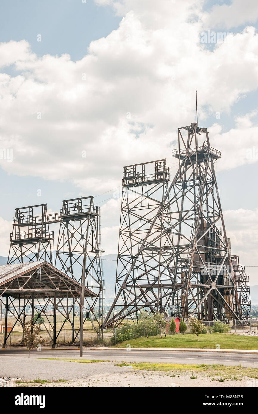 Mining headframes stand out against clouds and a blue sky Stock Photo ...