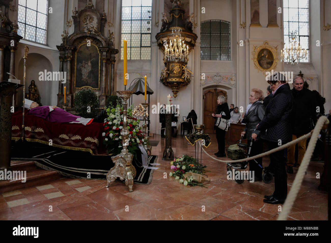 Mainz, Germany. 15th Mar, 2018. People file past the body of Cardinal ...