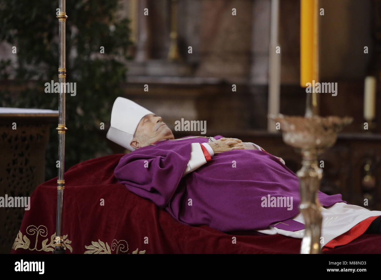The body Cardinal Karl Lehmann lies in front of the altar on a ...