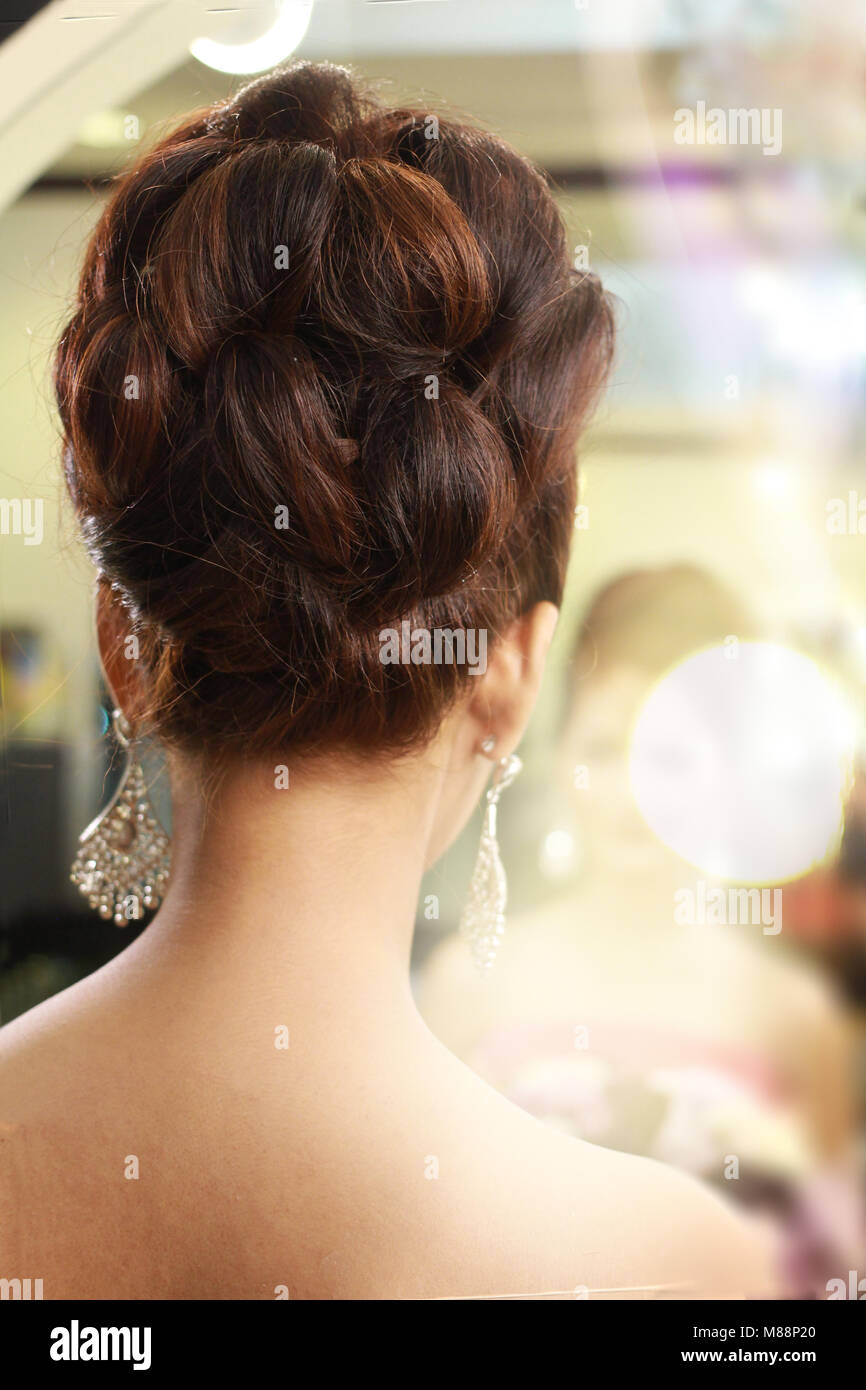 a completed beautiful hair up style look like grape bunch after hairdo ...