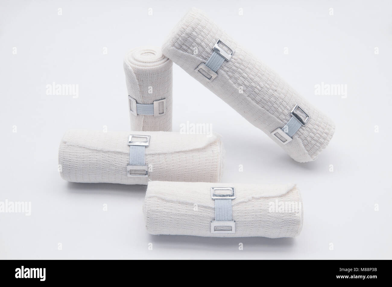 White elastic bandage at white background Stock Photo - Alamy