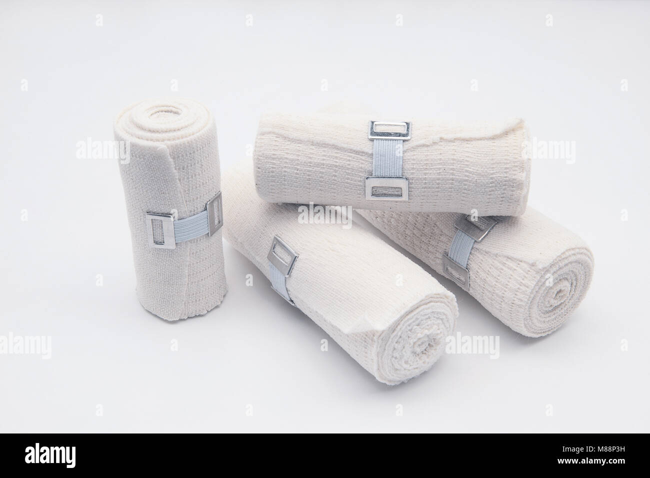 White elastic bandage at white background Stock Photo - Alamy