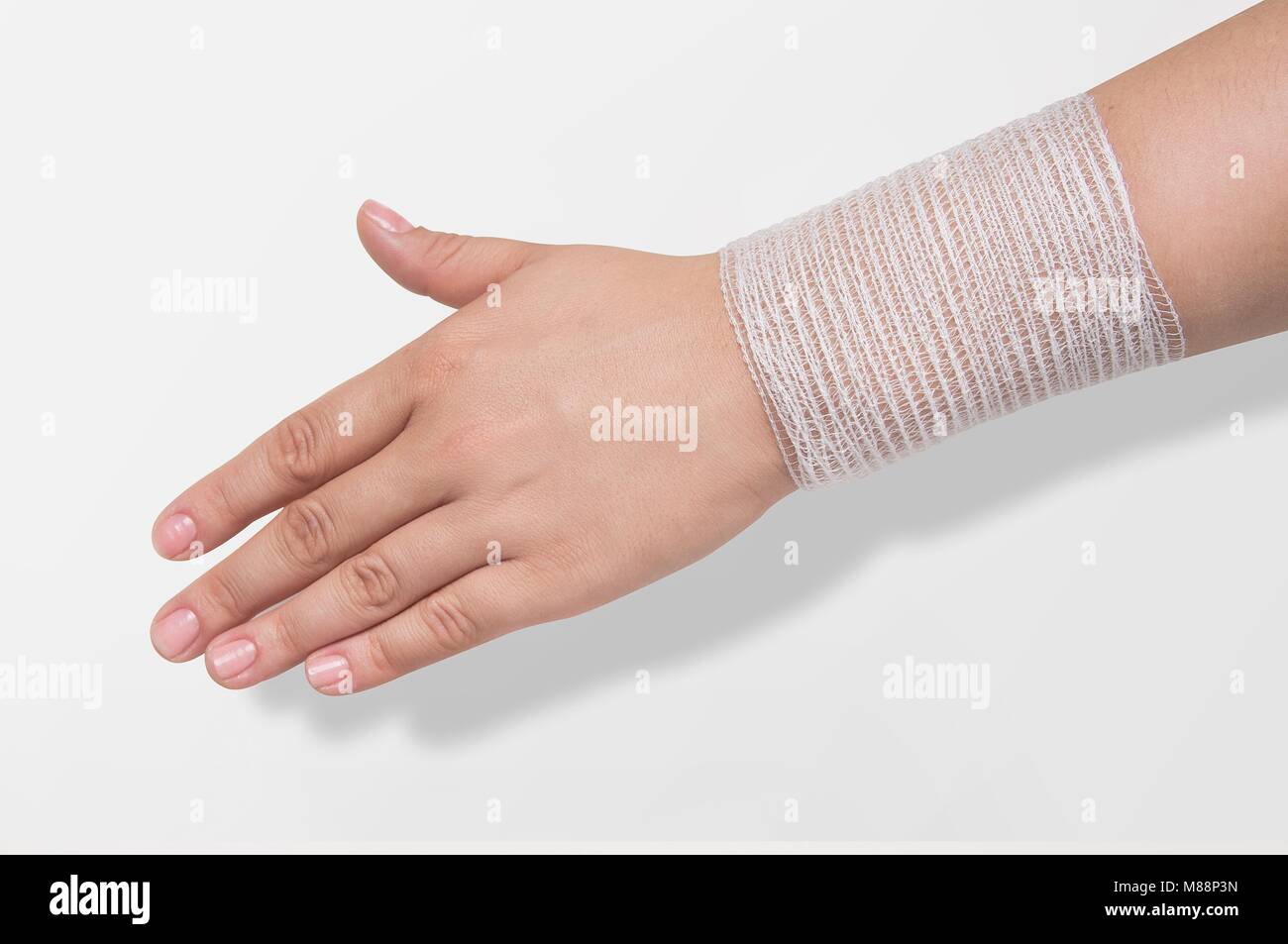 Medicine elastic bandage on human hand Stock Photo - Alamy