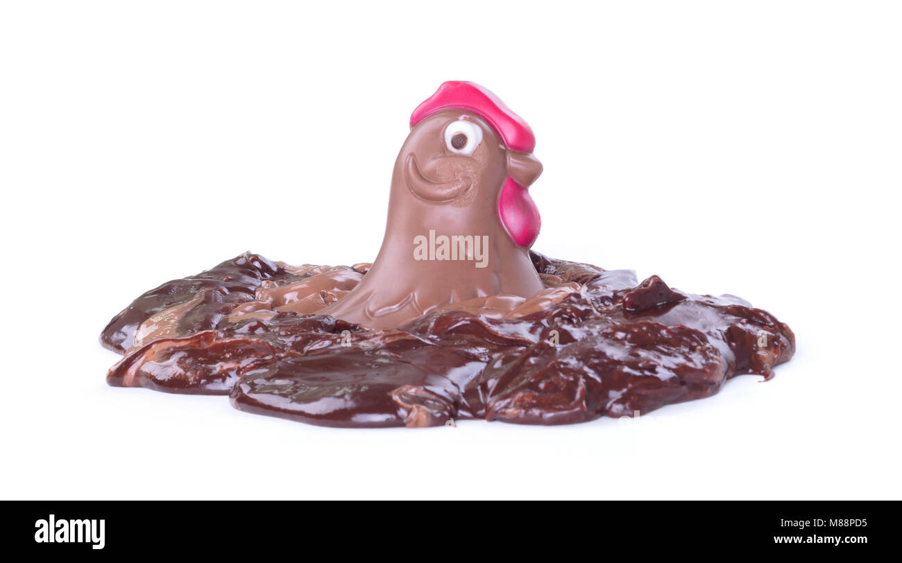 Melting chocolate easter chicken - Isolated on white background Stock ...