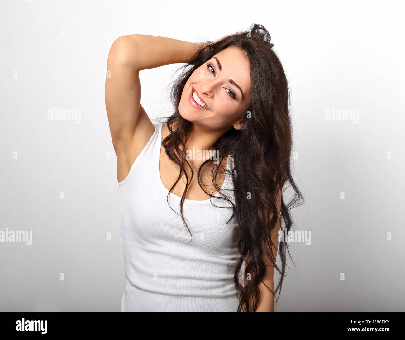 Beautiful positive fun happy woman in white shirt with toothy smile ...