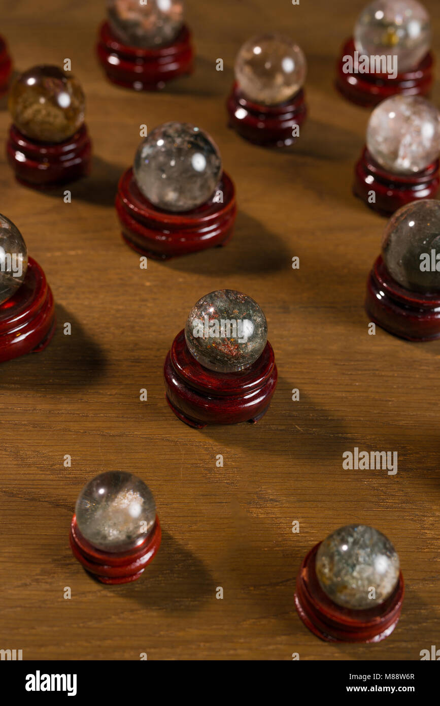 Collection of beautiful precious stones on wooden table Stock Photo - Alamy