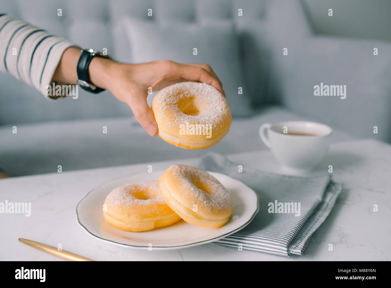 Food and Bakery, Hand Holding Delicious Fresh and Sweet Donut with ...