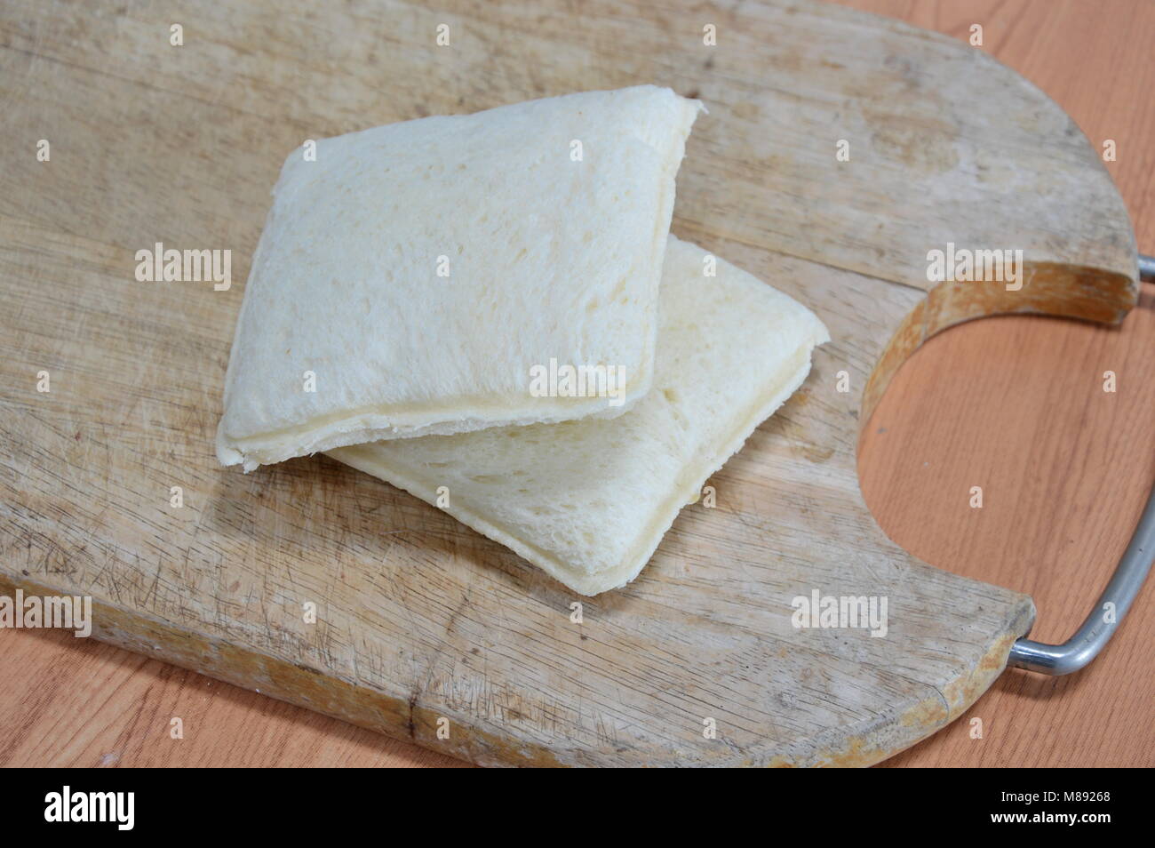 sandwich on wooden chop block Stock Photo - Alamy