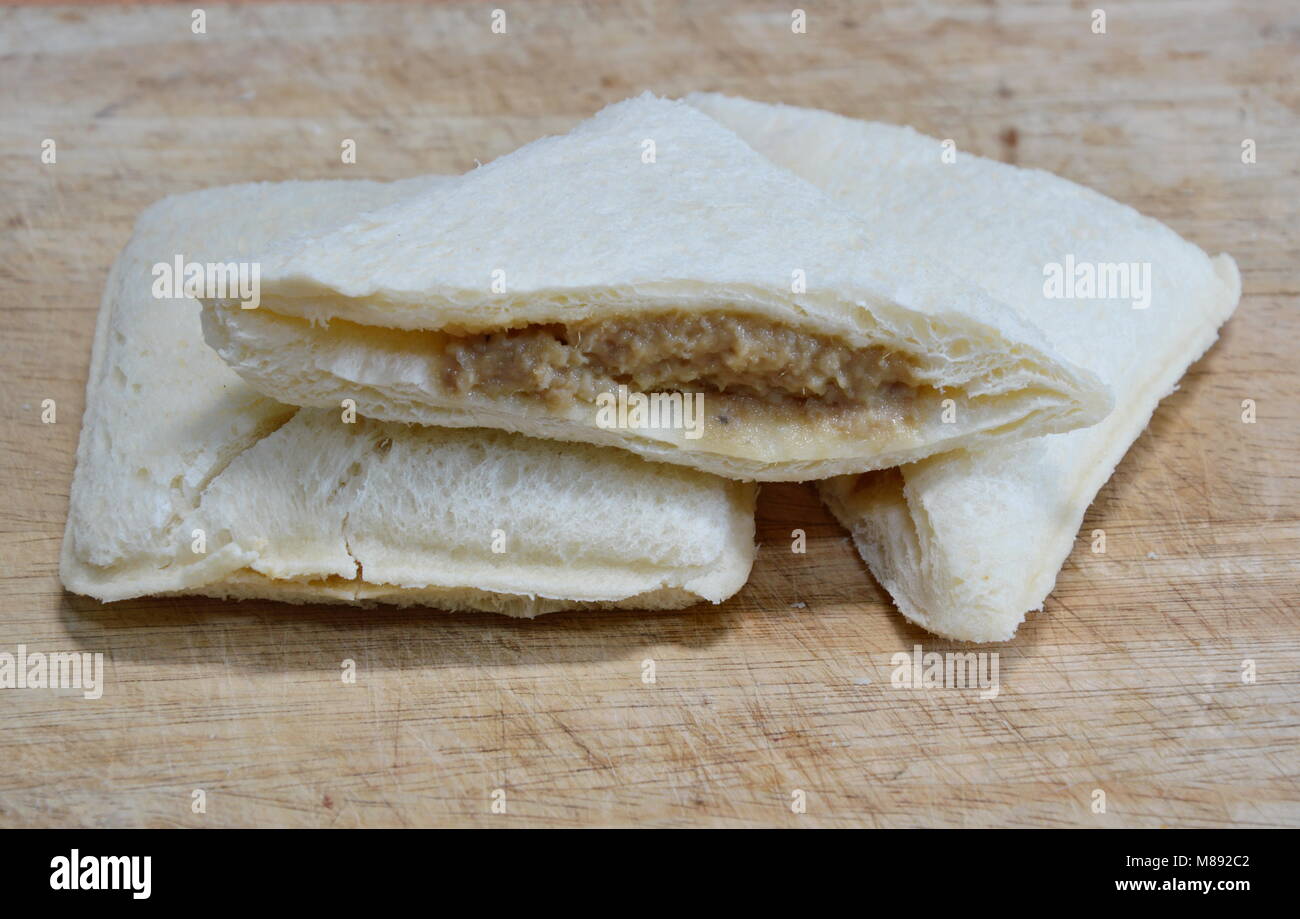 sandwich on wooden chop block Stock Photo - Alamy