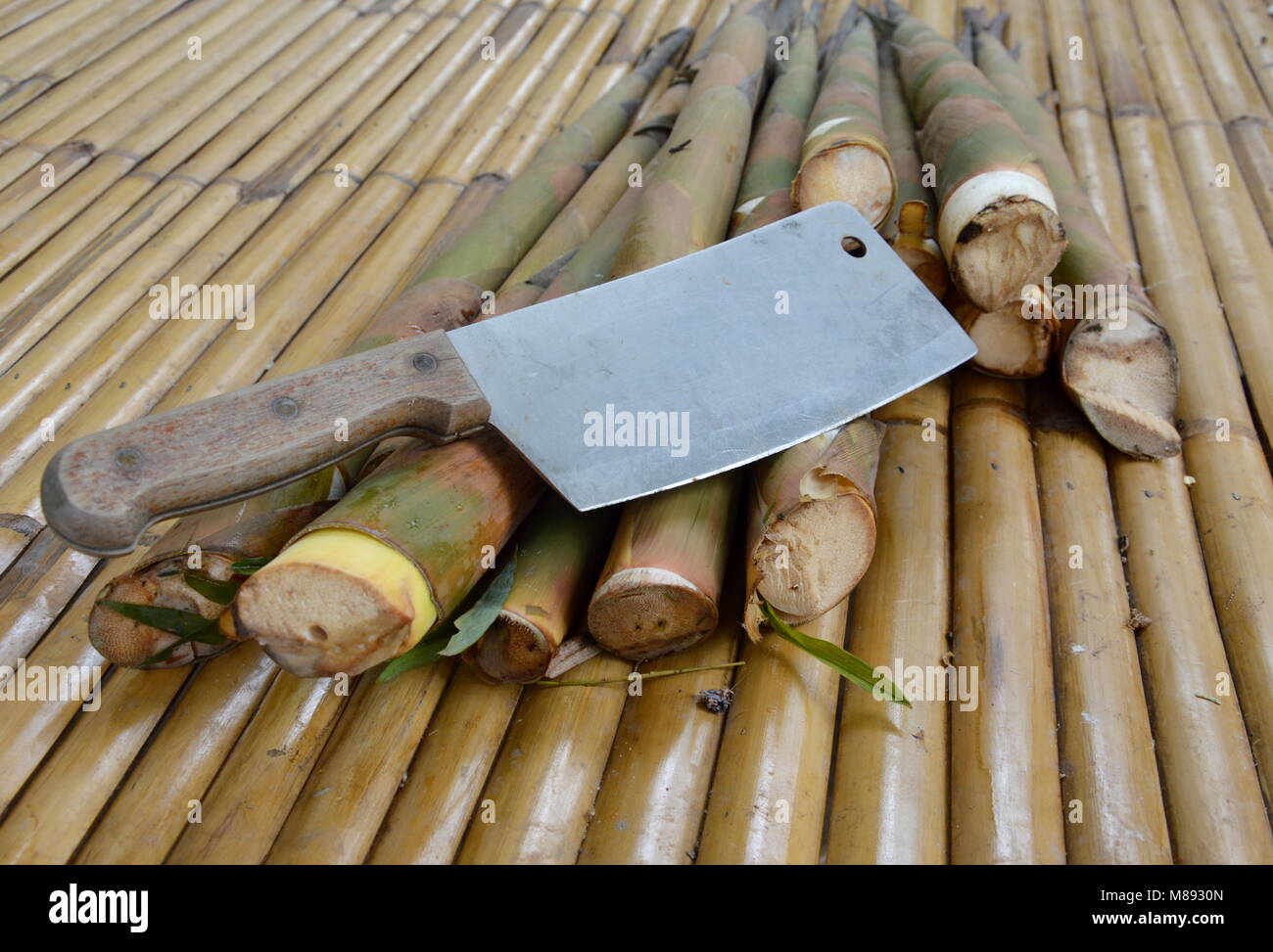 bamboo shoot and chop knife on bamboo table Stock Photo - Alamy
