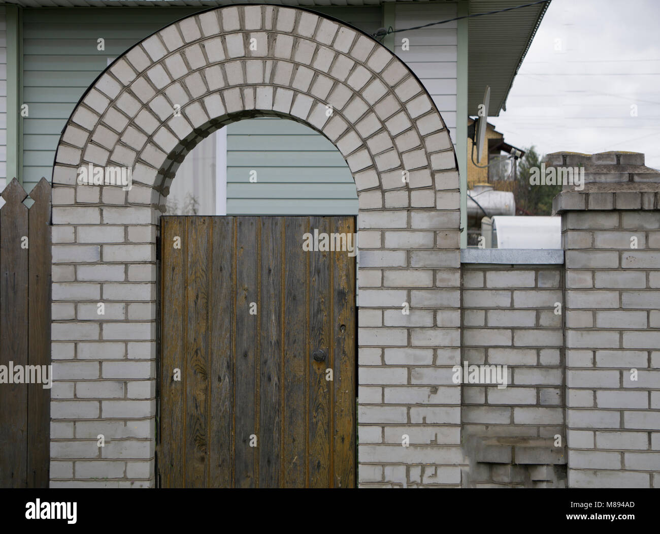 Stone arch on a white background. entrance door Stock Photo - Alamy