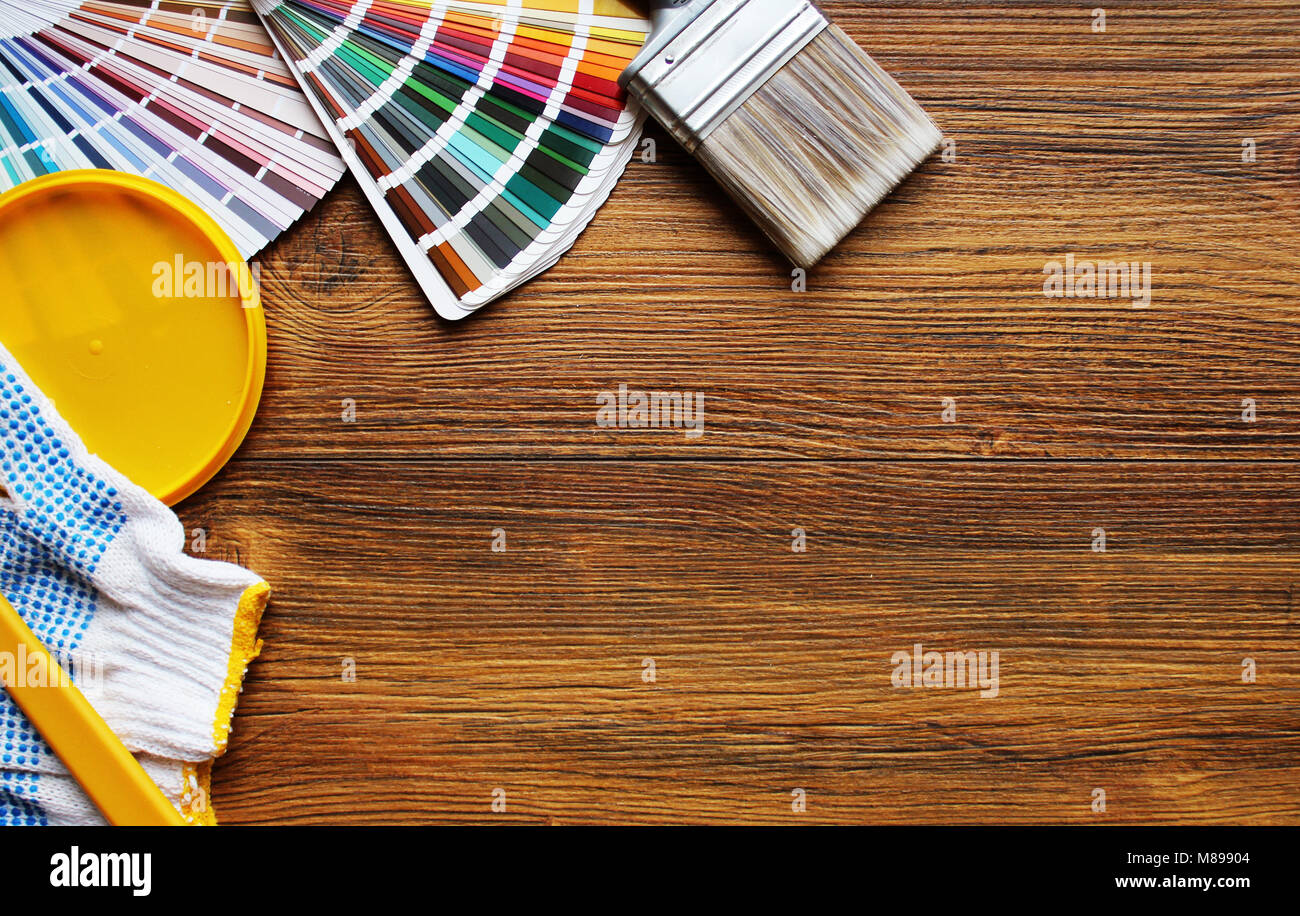 various painting tools and color palette on wooden background Stock ...