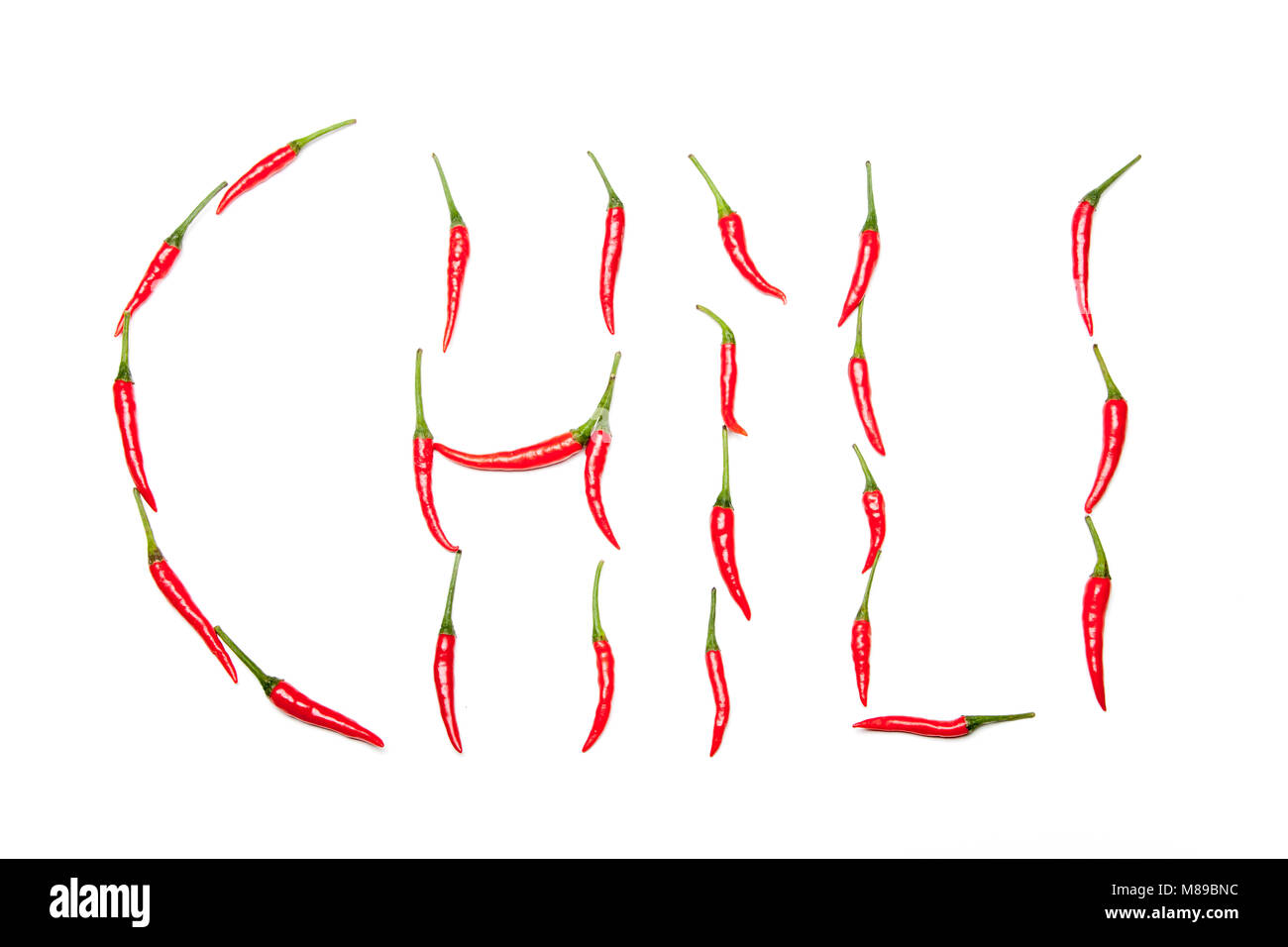 Red chilli chili peppers spelling Cut Out Stock Images & Pictures - Alamy