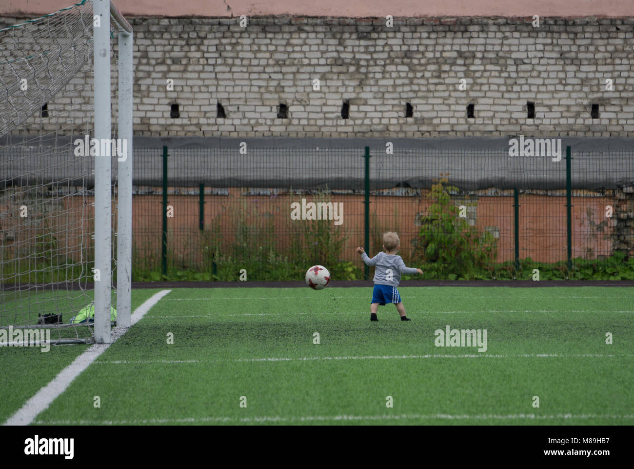 a very small footballer Stock Photo - Alamy