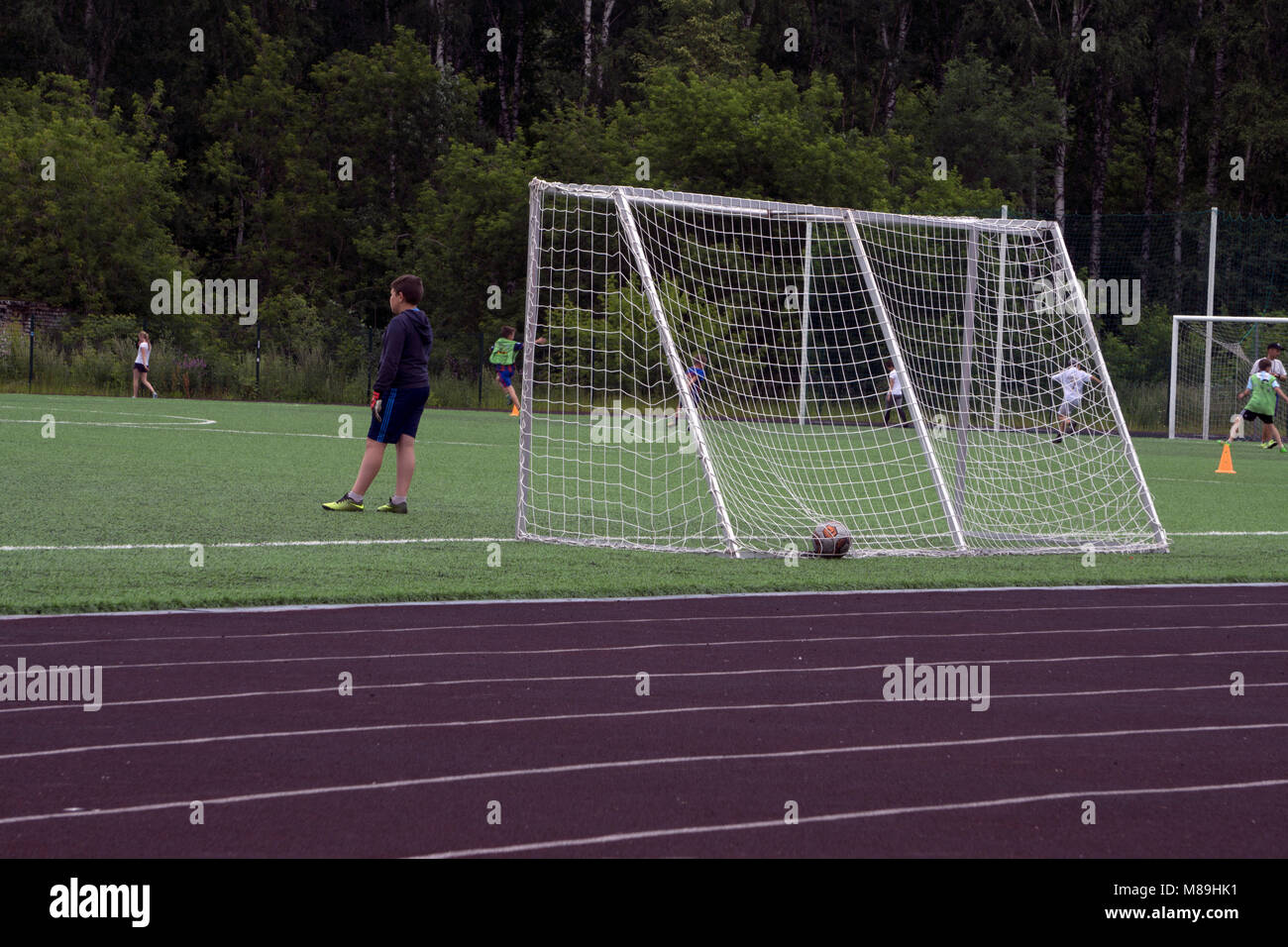 a very small footballer Stock Photo - Alamy
