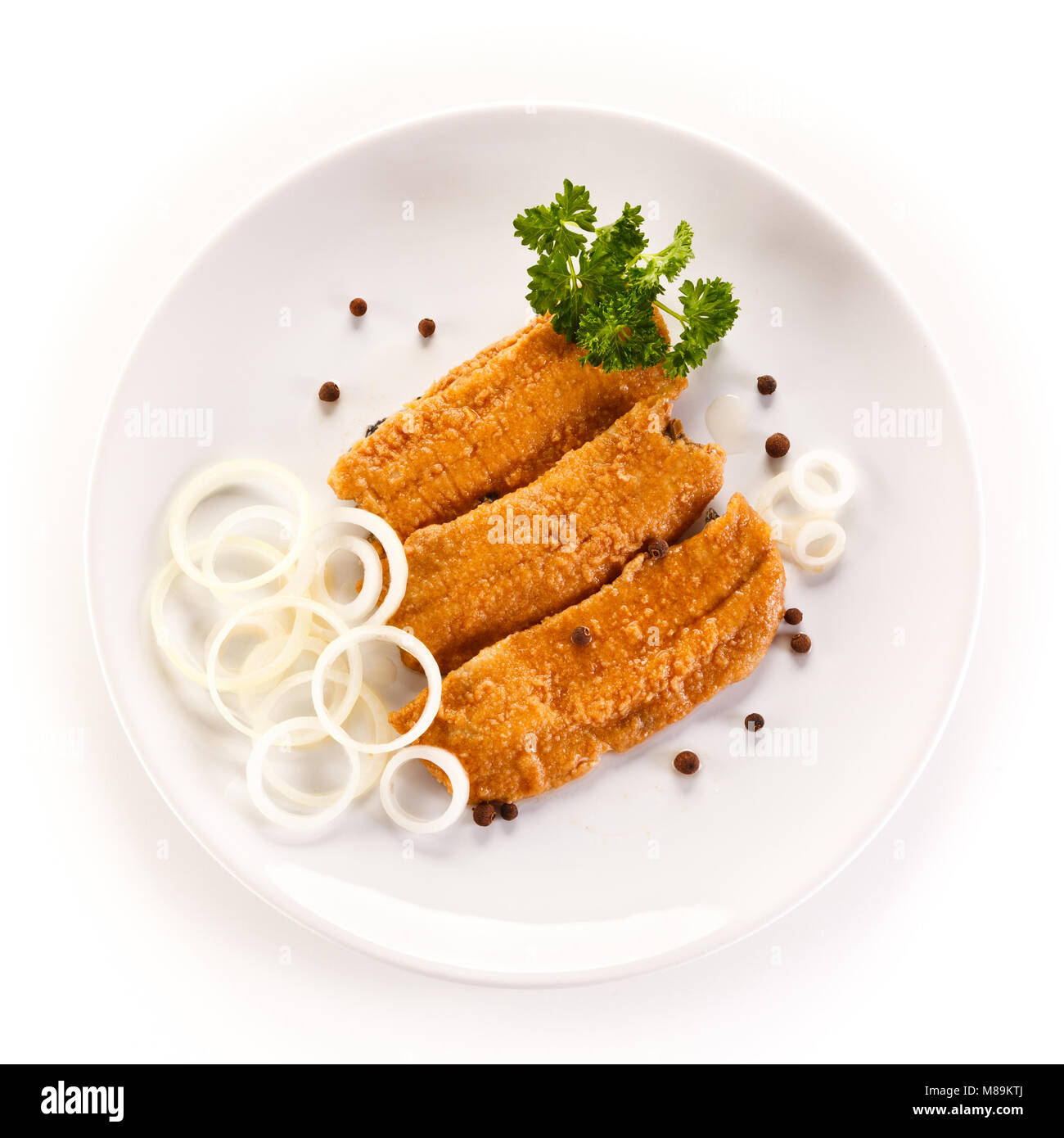 Plate fried cod fish Cut Out Stock Images & Pictures - Alamy