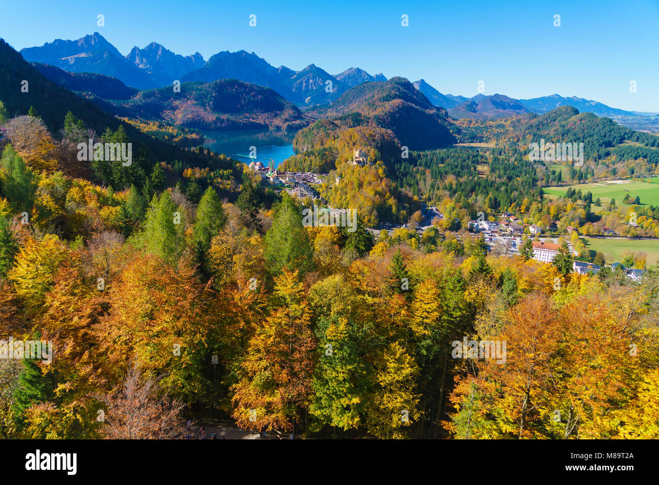 Hohenschwangau lake near Neuschwanstein Castle and Alps mountains at ...