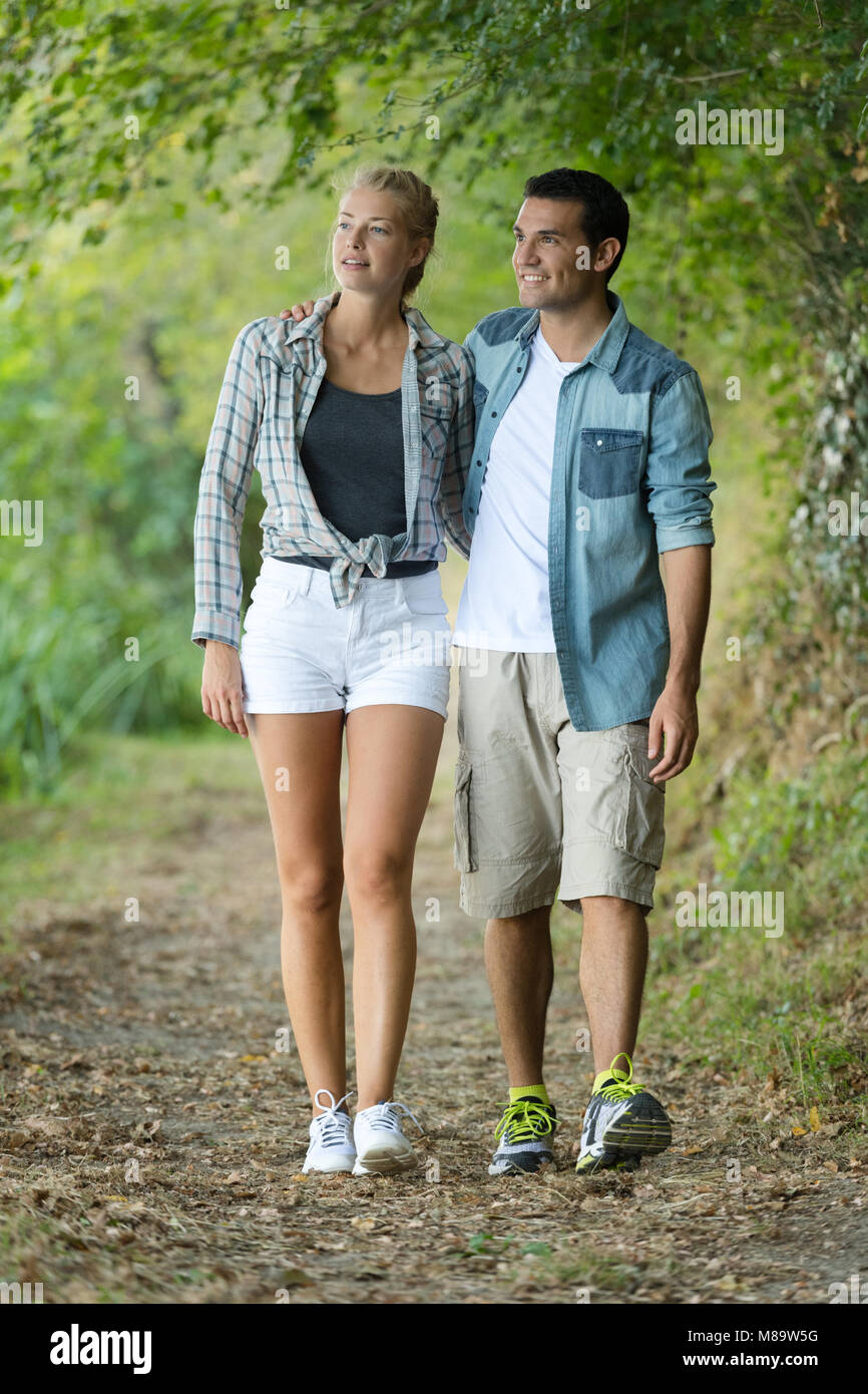 couple going on a stroll in a park Stock Photo - Alamy