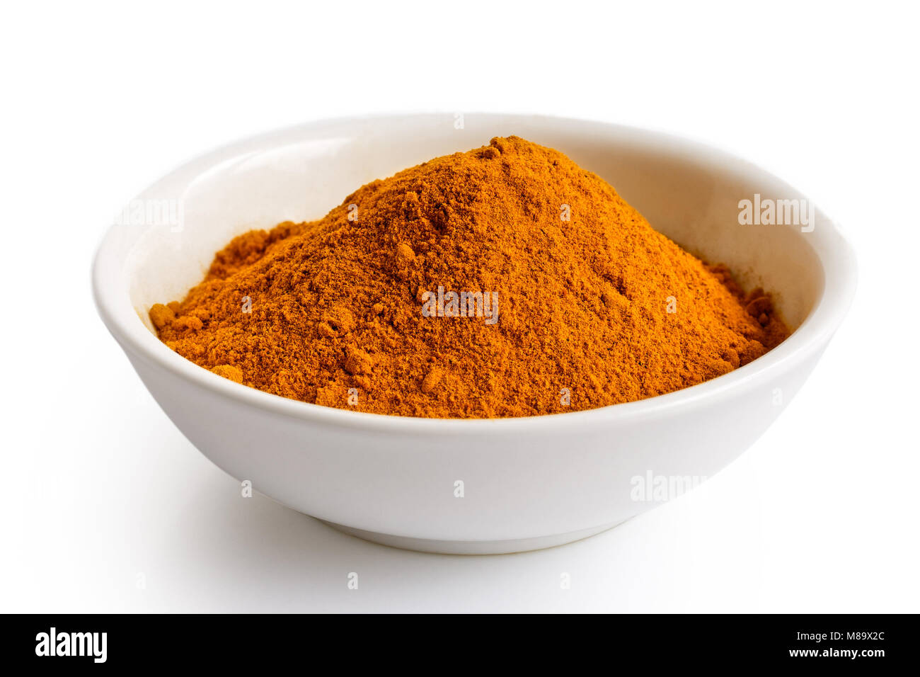 Ground saffron in white ceramic bowl isolated on white Stock Photo - Alamy